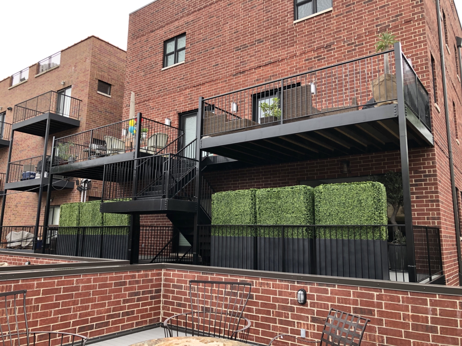 custom faux boxwood privacy hedges residential design exterior ...